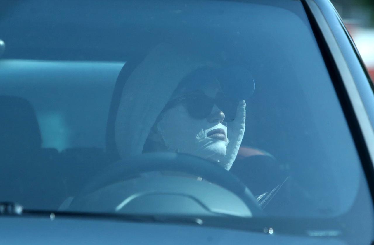 Katy Perry Drives Away From Beautician In Face Mask