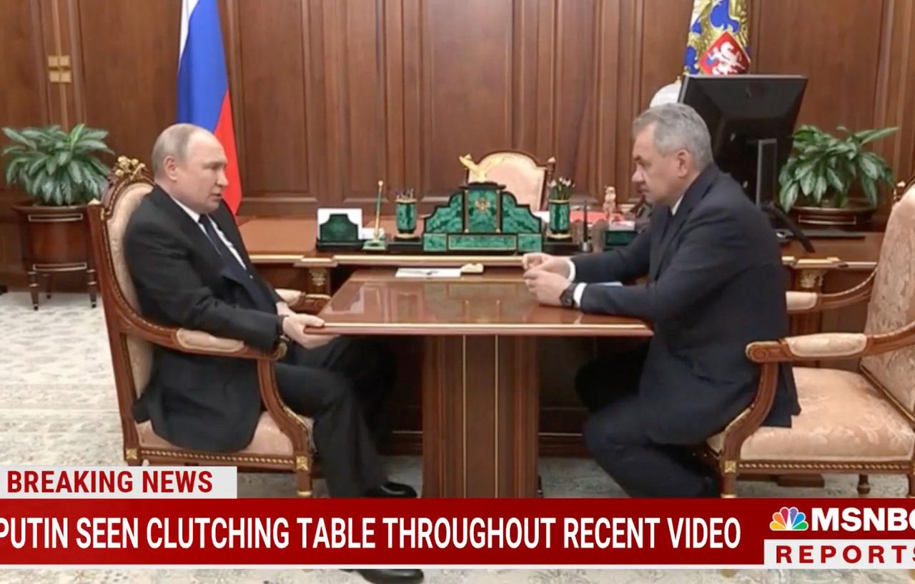 Putin Tightly Grips Table As Ailing Health Rumors Swirl