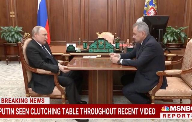 Putin Tightly Grips Table As Ailing Health Rumors Swirl