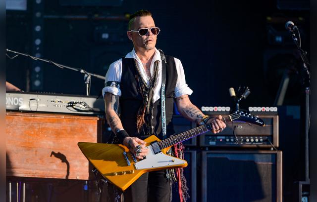 Johnny Depp Performs After Booze Bender Revelations