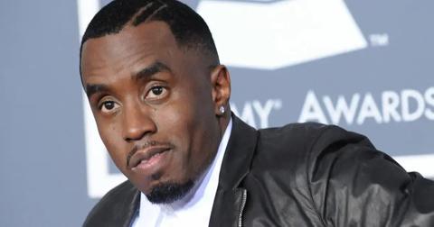 Diddy Flashes Smile and One-Finger Salute During Carefree Dinner With Son