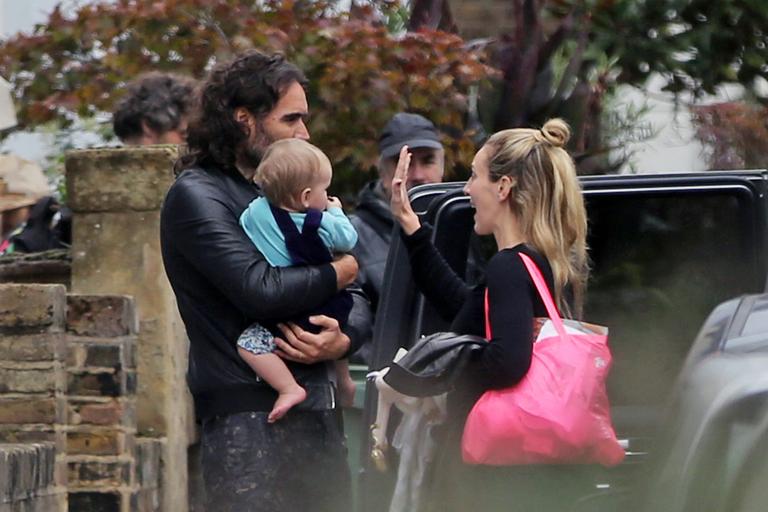 Russell Brand Shows Off His Sweet Side, Cradles Baby Girl During Family ...