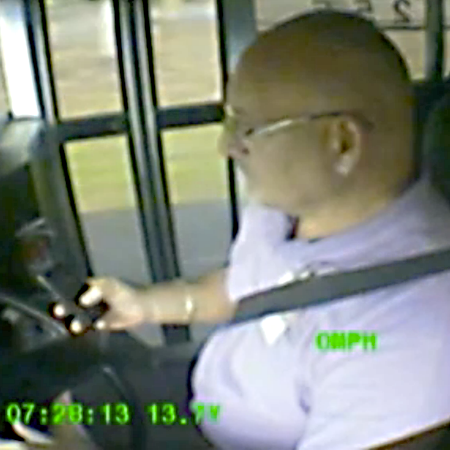 Florida School Bus Driver Caught On Tape Texting While Driving - Twice!