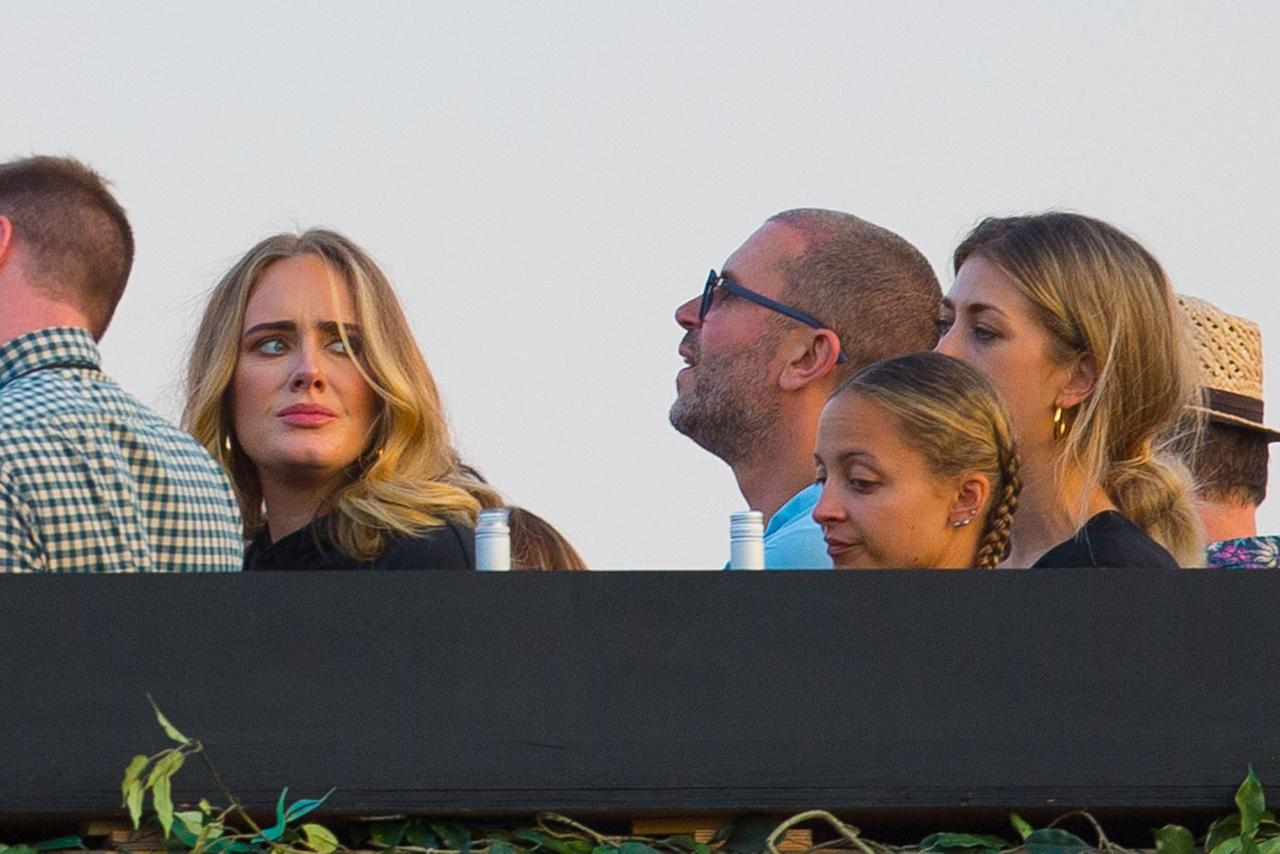 Adele Locks Hands With Male Friend At Celine Dion Concert