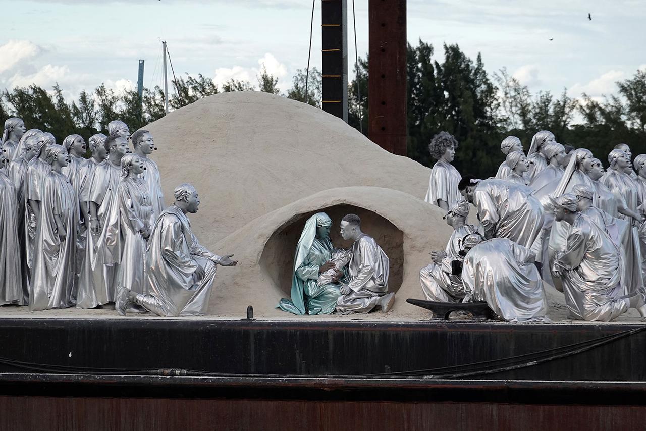 Kanye West Wears Silver Body Paint & Robe For Miami Opera