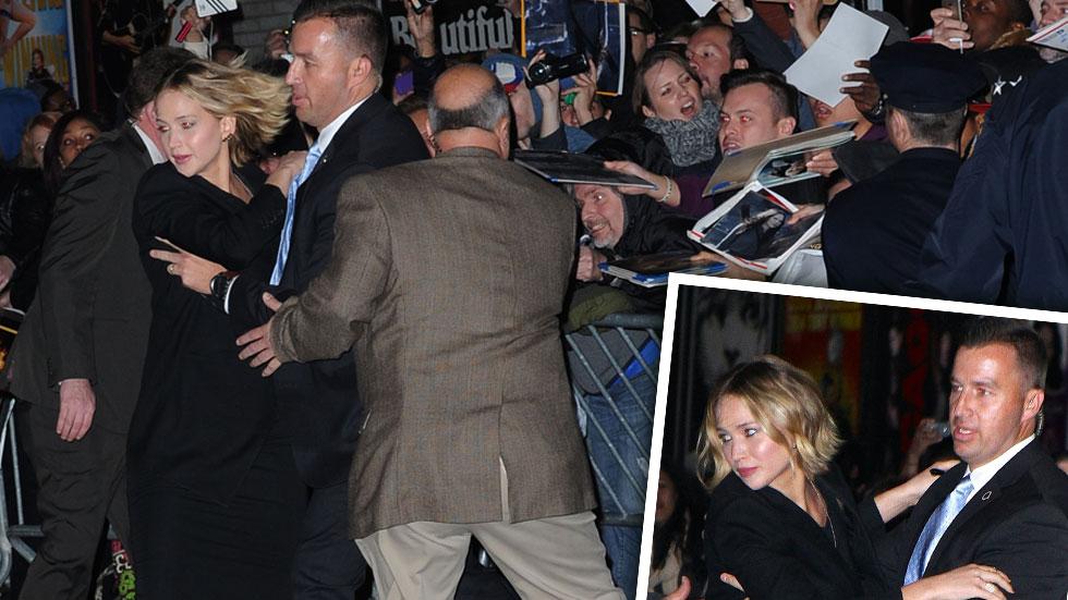 Fans Attack! Watch Jennifer Lawrence Dive Into SUV After Crowd Goes Wild