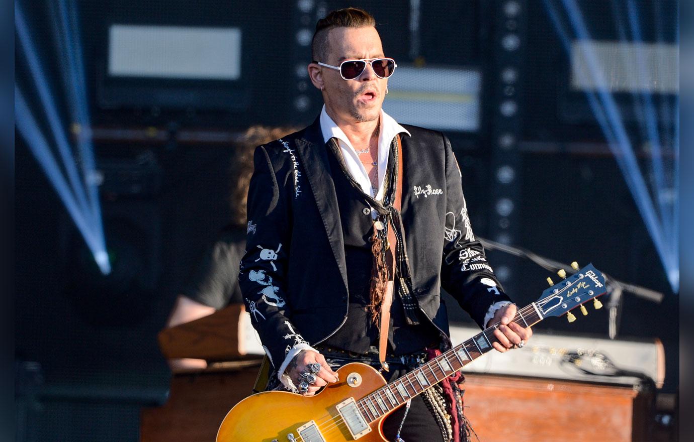 Johnny Depp Performs After Booze Bender Revelations