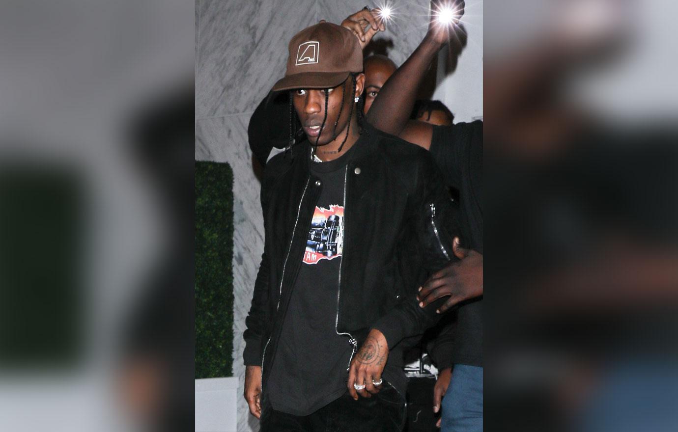 Travis Scott Seen Pacing Locked In Intense Phone Call Outside $14 ...