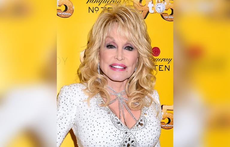 Dolly Parton's Plastic Face Fiasco Revealed In Shocking New Photos