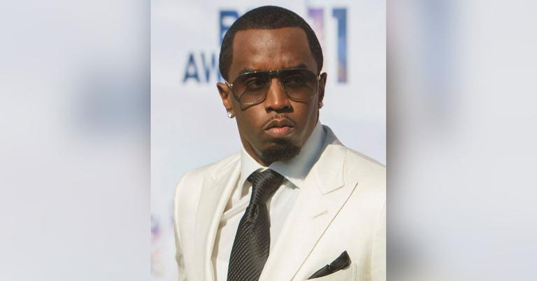 Diddy Looks Unrecognizable With Gray Hair & Beard In First Prison Videos