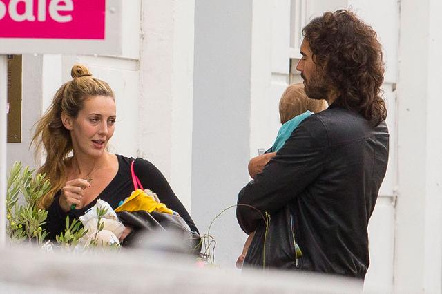 Russell Brand Shows Off His Sweet Side, Cradles Baby Girl During Family ...