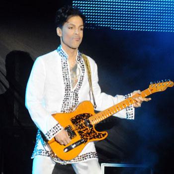 VIDEO: Prince Rides A Bike Through Crowd After LA Concert!