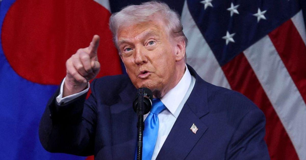 Donald Trump's Right Hand Appears Covered In Makeup at NFL Appearance