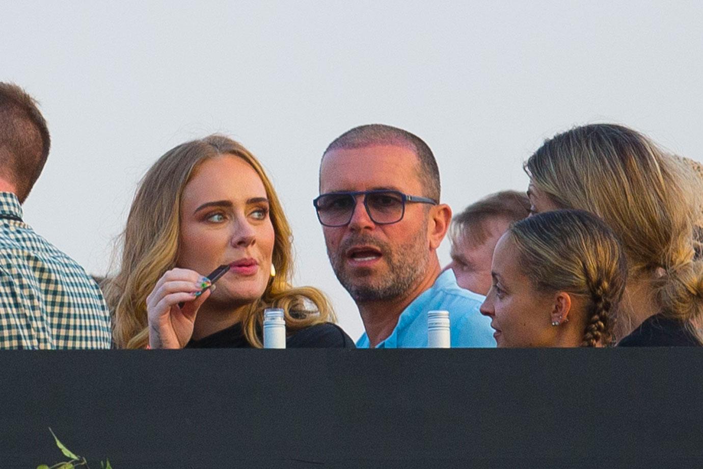 Adele Locks Hands With Male Friend At Celine Dion Concert