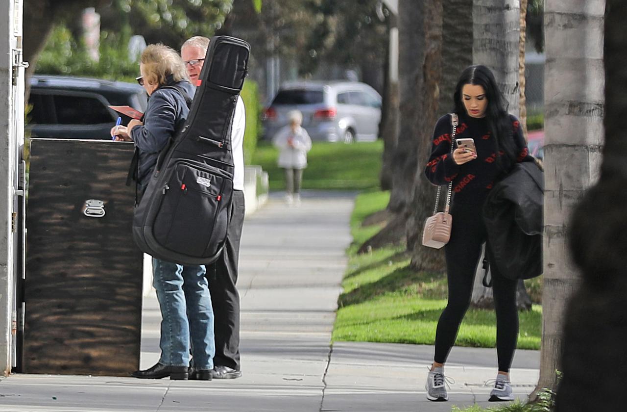 Don McLean Acts Bored While Out With Girlfriend Paris Dylan