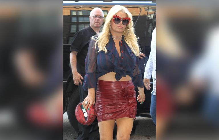 Jessica Simpson Shows Curves & Belly In Red Leather Skirt