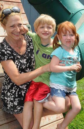 PHOTOS: 14 Single Stars Who Have Adopted Children