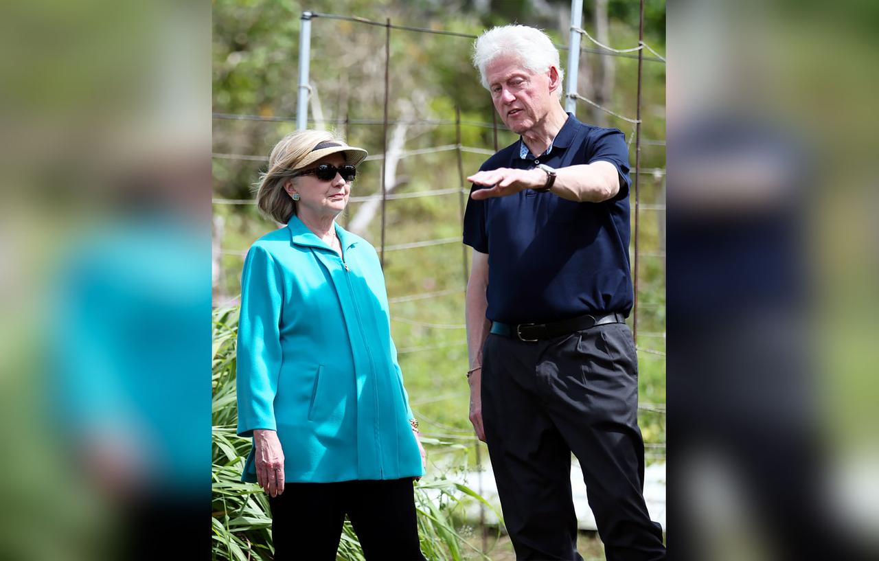 Hillary Clinton Looks Tense On Beach Stroll With Bill As Monica ...