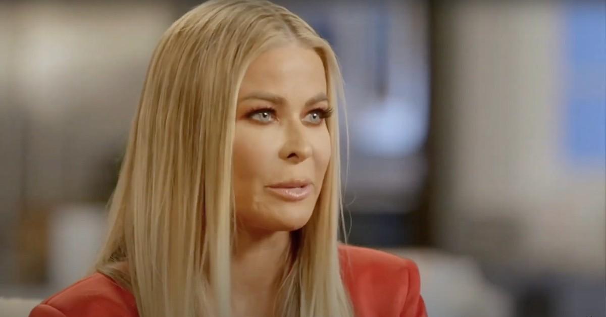 Carmen Electra has lifted the lid on the pain behind her 'Baywatch' grin.