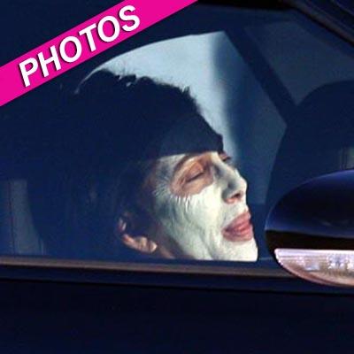 Cher Turns Back Time -- With Mask!