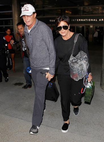 Kris & Bruce Jenner Arrive To LAX — Hand-In-Hand!