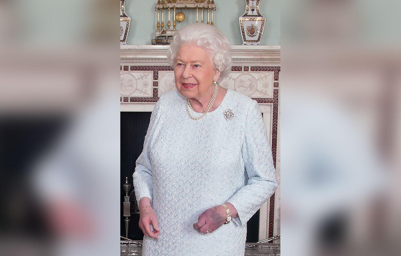 Queen Elizabeth Shows Off Bruised, Purple Hand In Scary New Photos