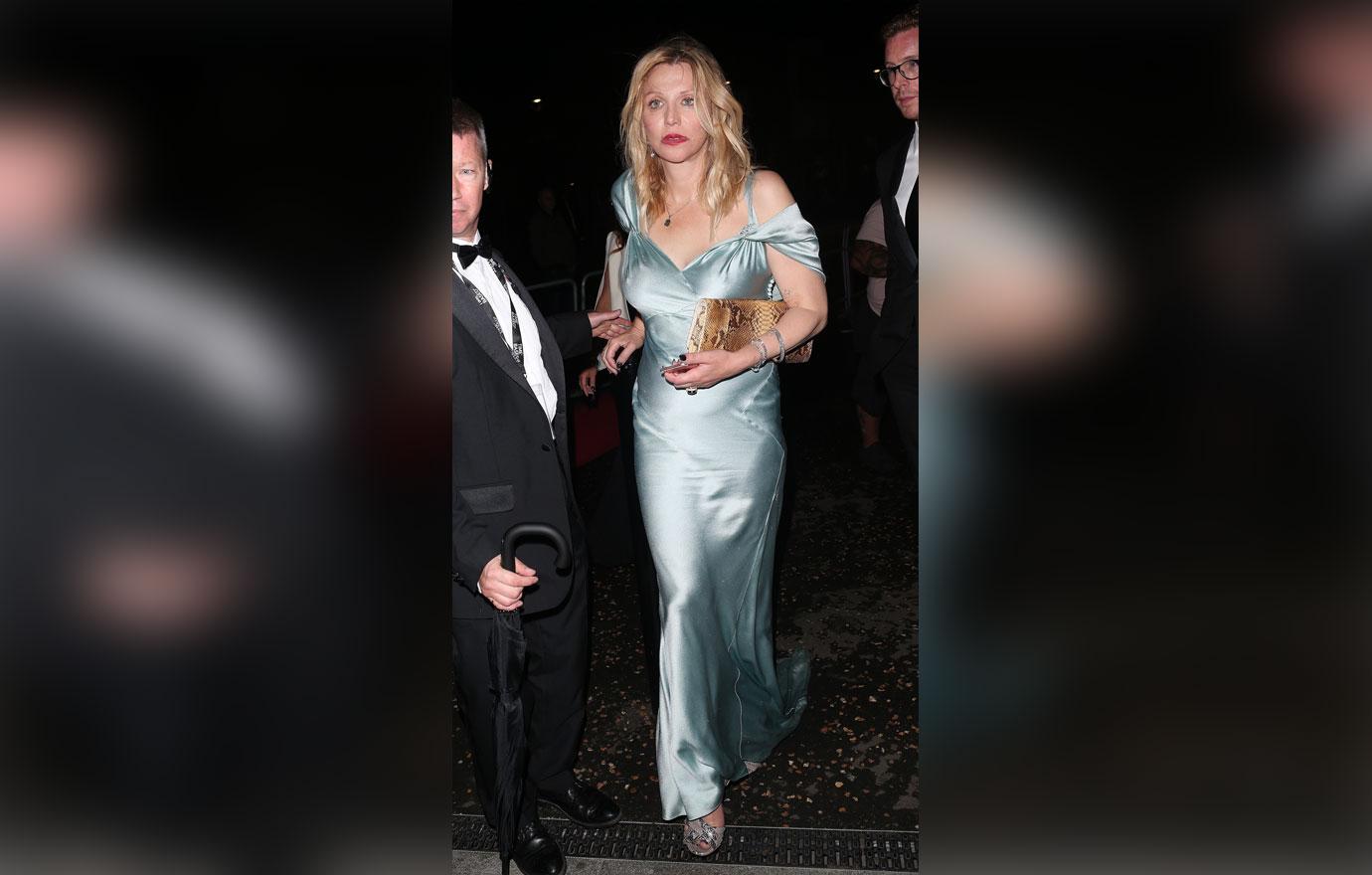 Courtney Love Looks Drunk & Bleary-Eyed At GQ Party