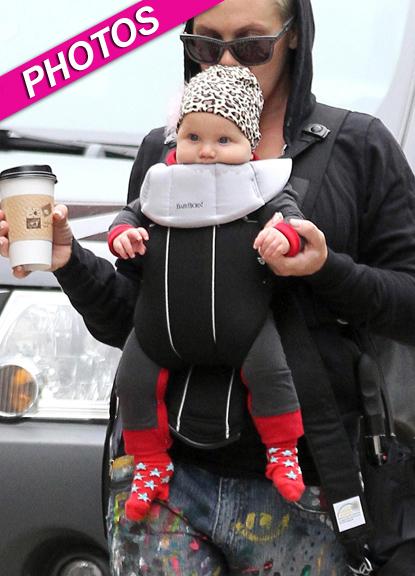 Pink Keeps Baby Willow Close To Her Heart