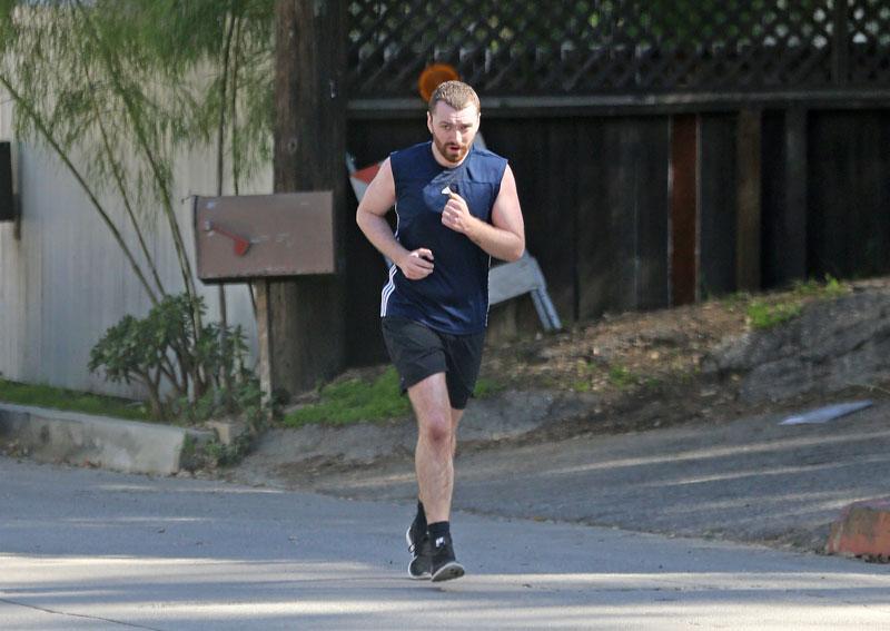 Scary Skinny Sam Smith Clutches Chest While Out For A Run