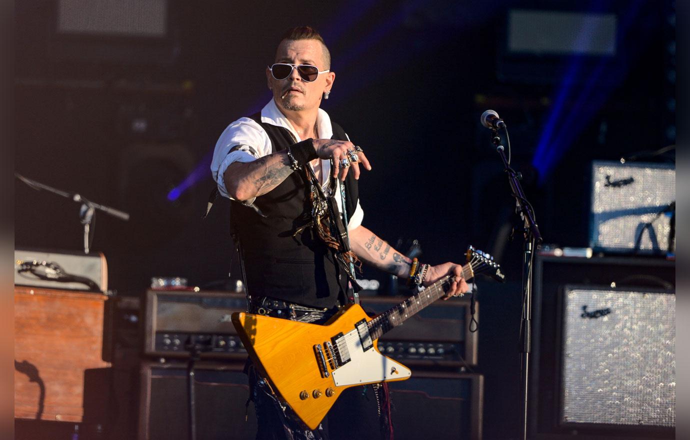 Johnny Depp Performs After Booze Bender Revelations