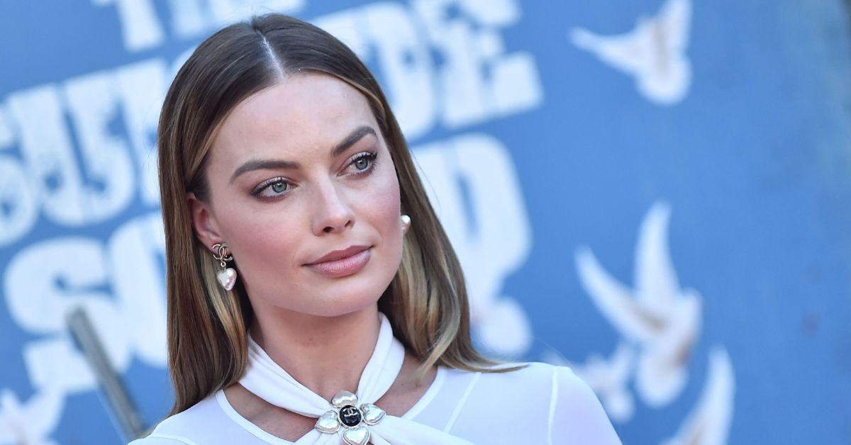 Photog Who Rushed Margot Robbie & Cara Delevingne Says Security Broke ...