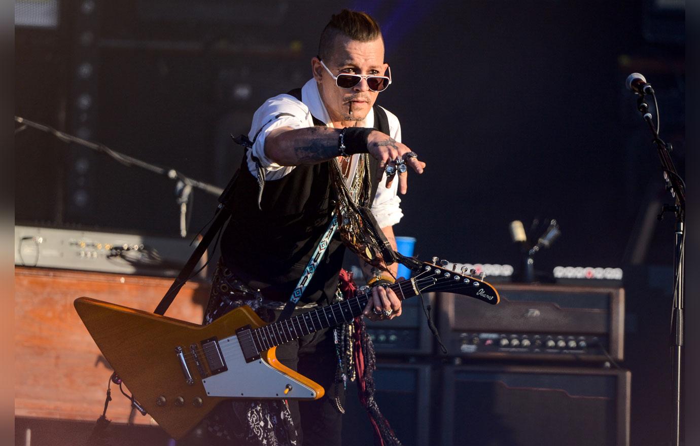 Johnny Depp Performs After Booze Bender Revelations