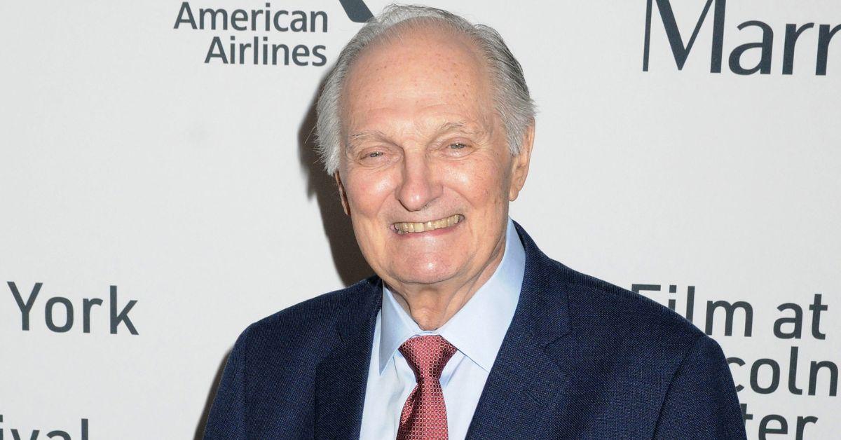 EXCLUSIVE: Alan Alda, 89, Confesses He Can’t Even Button Up a Shirt