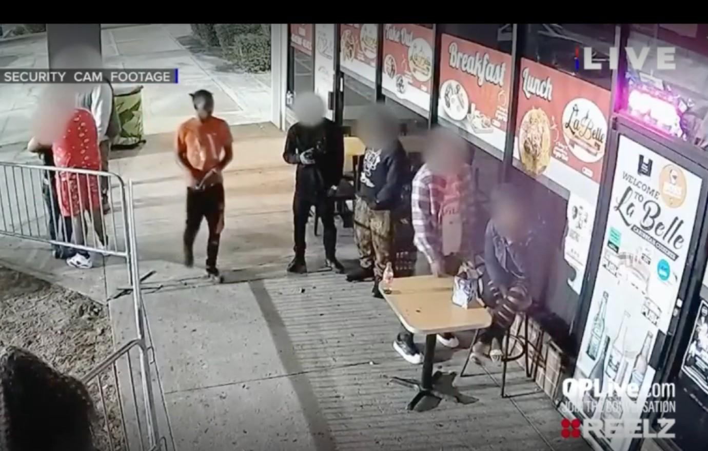 Security Camera Captures Moment Two Men Are Robbed At Gunpoint