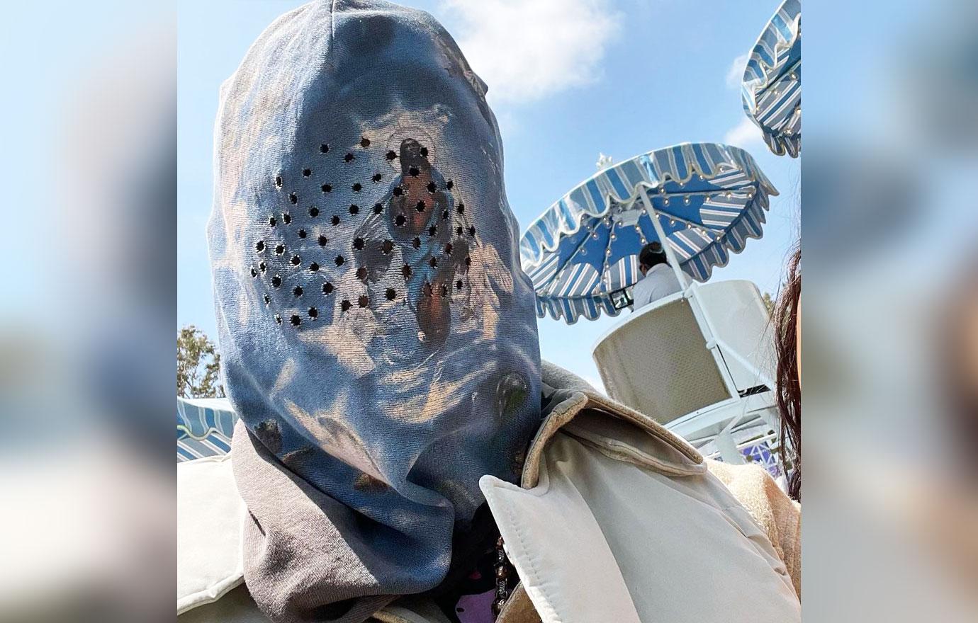 Travis Scott Sports Same Bizarre Face Covering As Kanye West