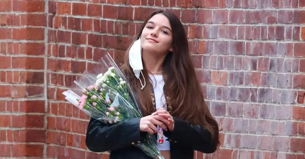 SPOTTED: Suri Cruise Steps Out With Guitar, Looks All Grown Up