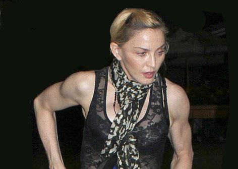 Strike A Pose! 54-Year-Old Madonna Exposes Her Muscles, Flaunts Sheer Vest