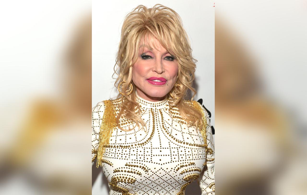 Dolly Parton's Plastic Face Fiasco Revealed In Shocking New Photos