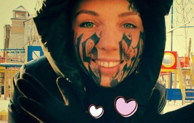 Russian Tattooist Inks His Name Across His Girlfriend's Face