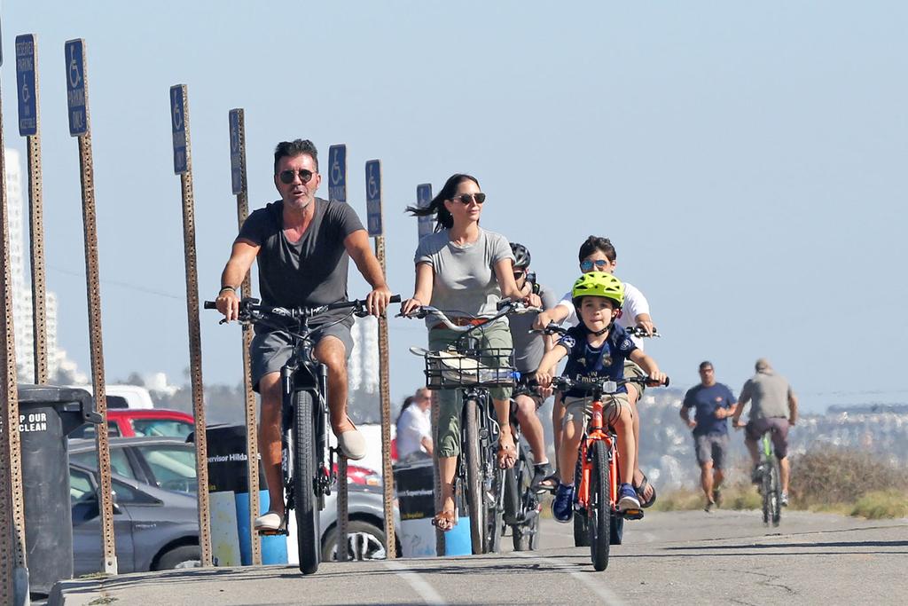 Simon Cowell Goes Bike Riding With His Family