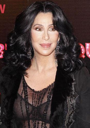 PHOTOS: Cher Bares All, Still Flauntin' It At Age 64