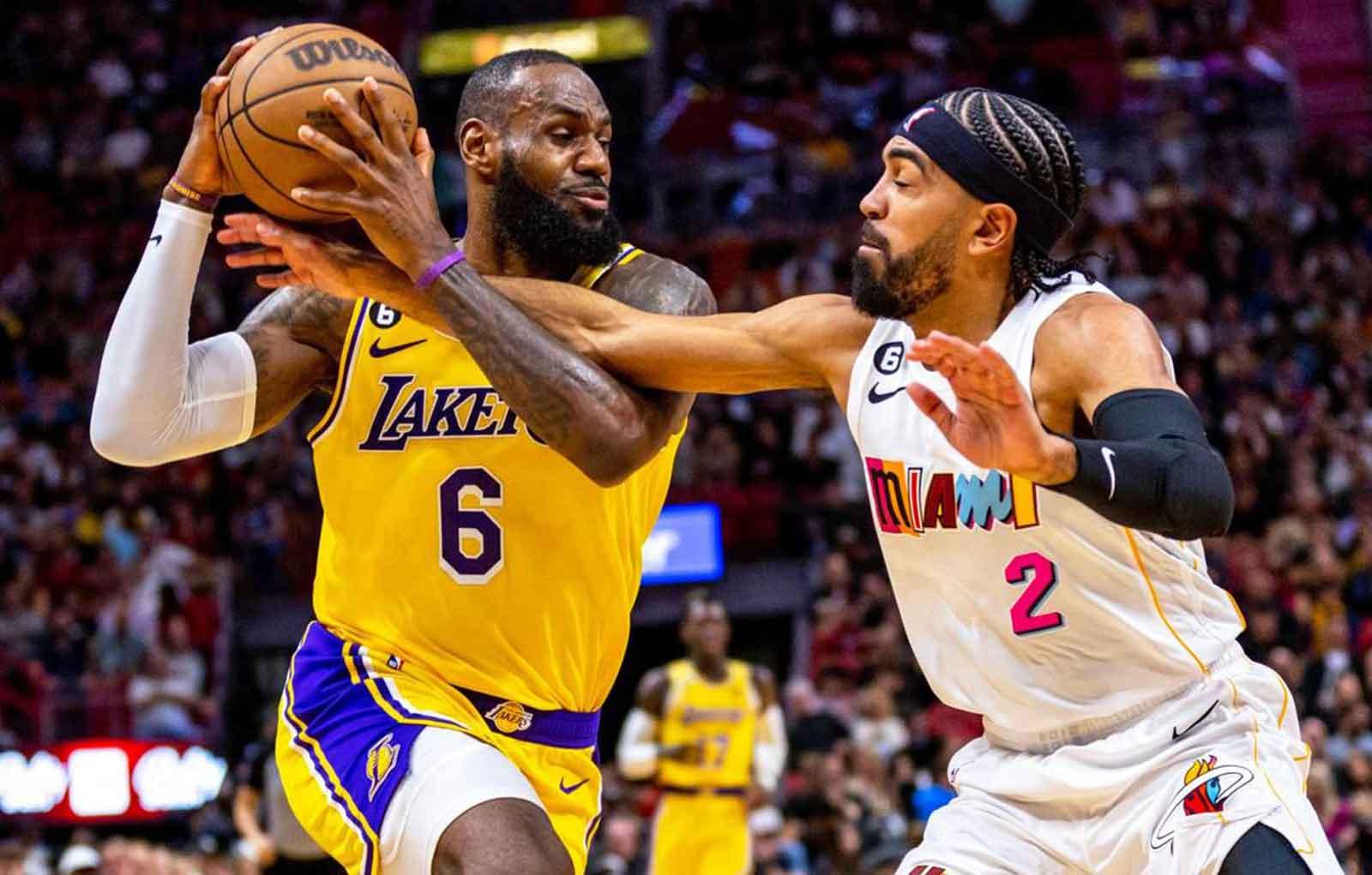 WATCH: LeBron James Restrained By Ref As Heckler Loudly Attacks His ...