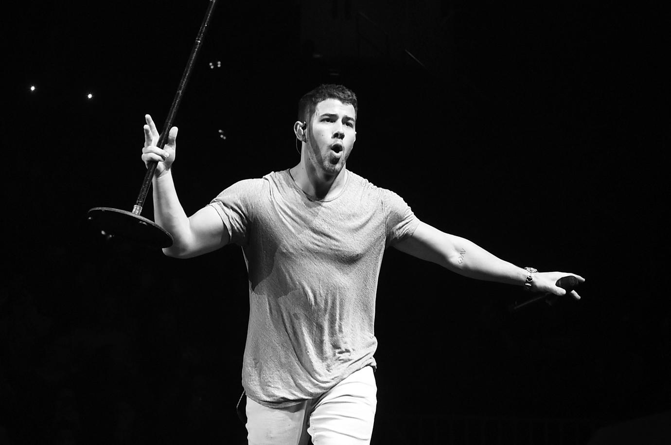 Nick Jonas Shows Off His Muscles At The