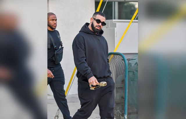 Drake Spotted Walking Around Streets Of LA Holding His Billboard Artist ...