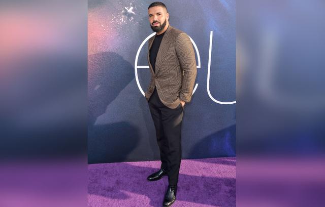 Drake Spotted Walking Around Streets Of LA Holding His Billboard Artist ...