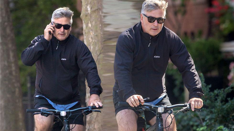 Alec Baldwin Talking On Phone While Driving...His Bicycle