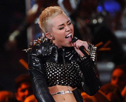 Crotch-Grabbing Miley Cyrus Goes Stage Wild.
