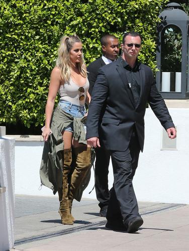 Khloe Kardashian Busts Out Of Tiny Tank Amid Feud With Chloe Grace Moretz