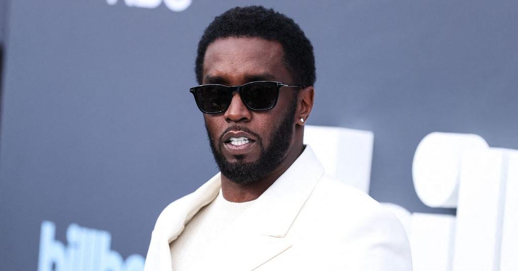 Pictured: Diddy 'Human Shield' Anna Wintour Looks Emotionless at Paris ...