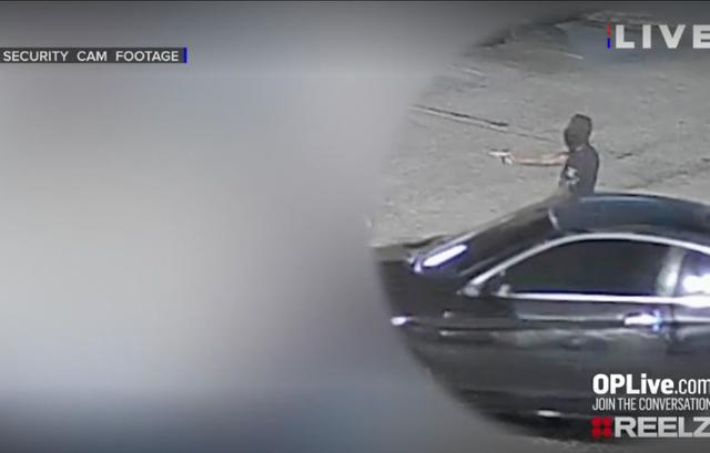 Security Camera Captures Moment Two Men Are Robbed At Gunpoint